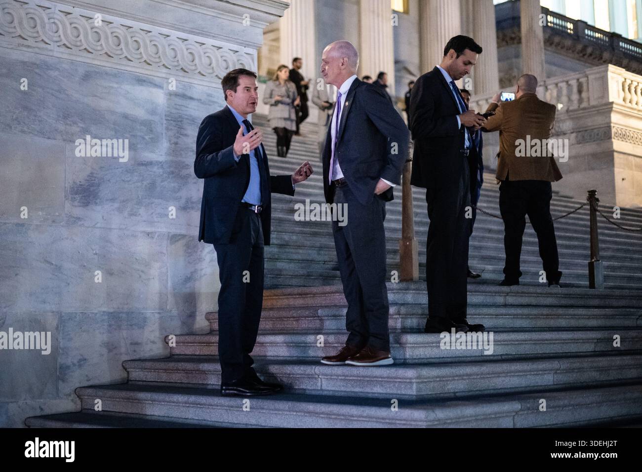 Reps. Seth Moulton (D-Mass.) and Adam Smith (D-Wash.) confer outside ...