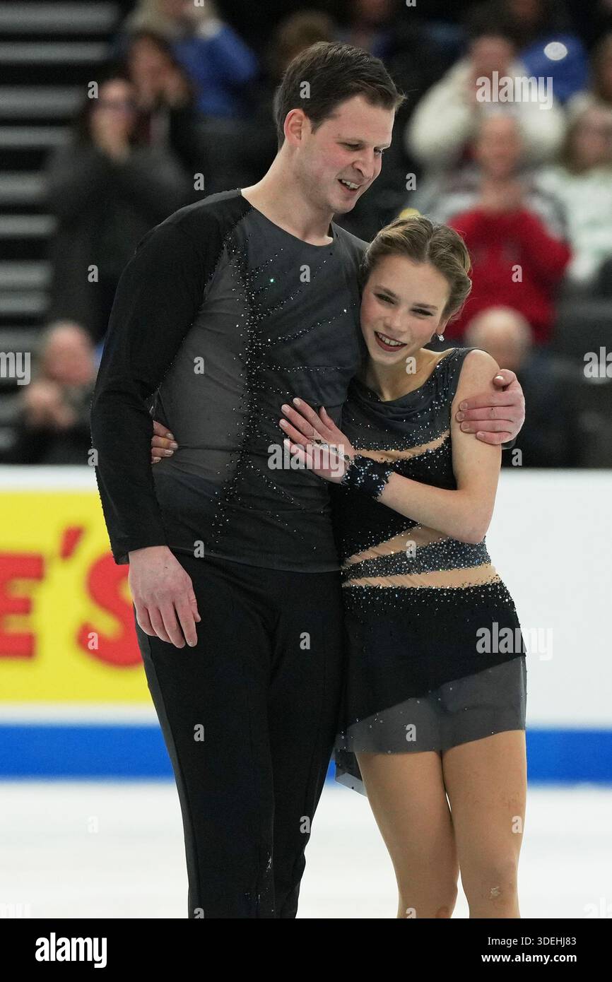 Alisa Efimova and Misha Mitrofanov compete during the pairs short ...