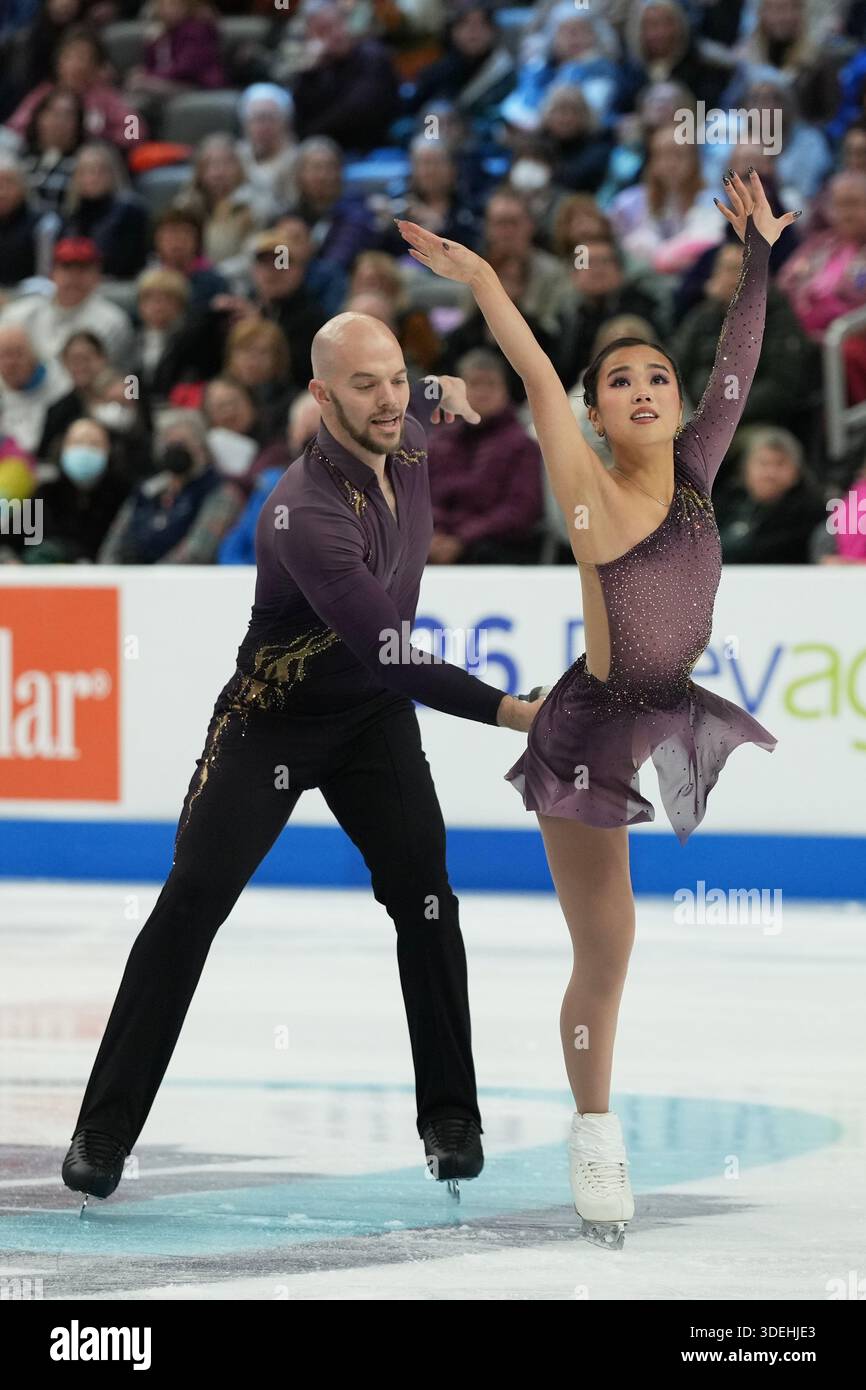 Ellie Kam and Danny O'Shea compete during the pairs short program at ...