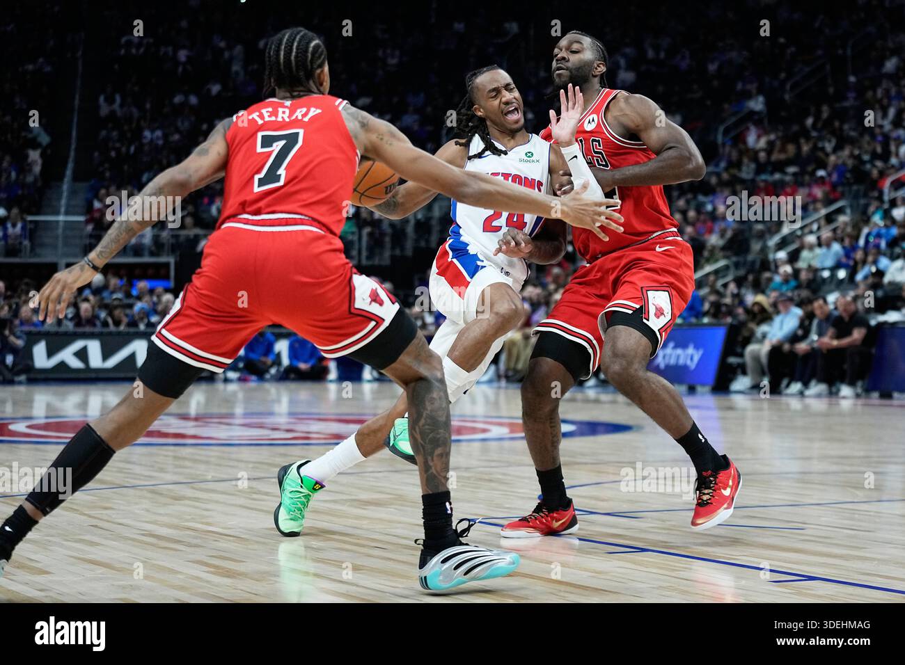 Detroit Pistons guard Daniss Jenkins, center, drives against Chicago ...