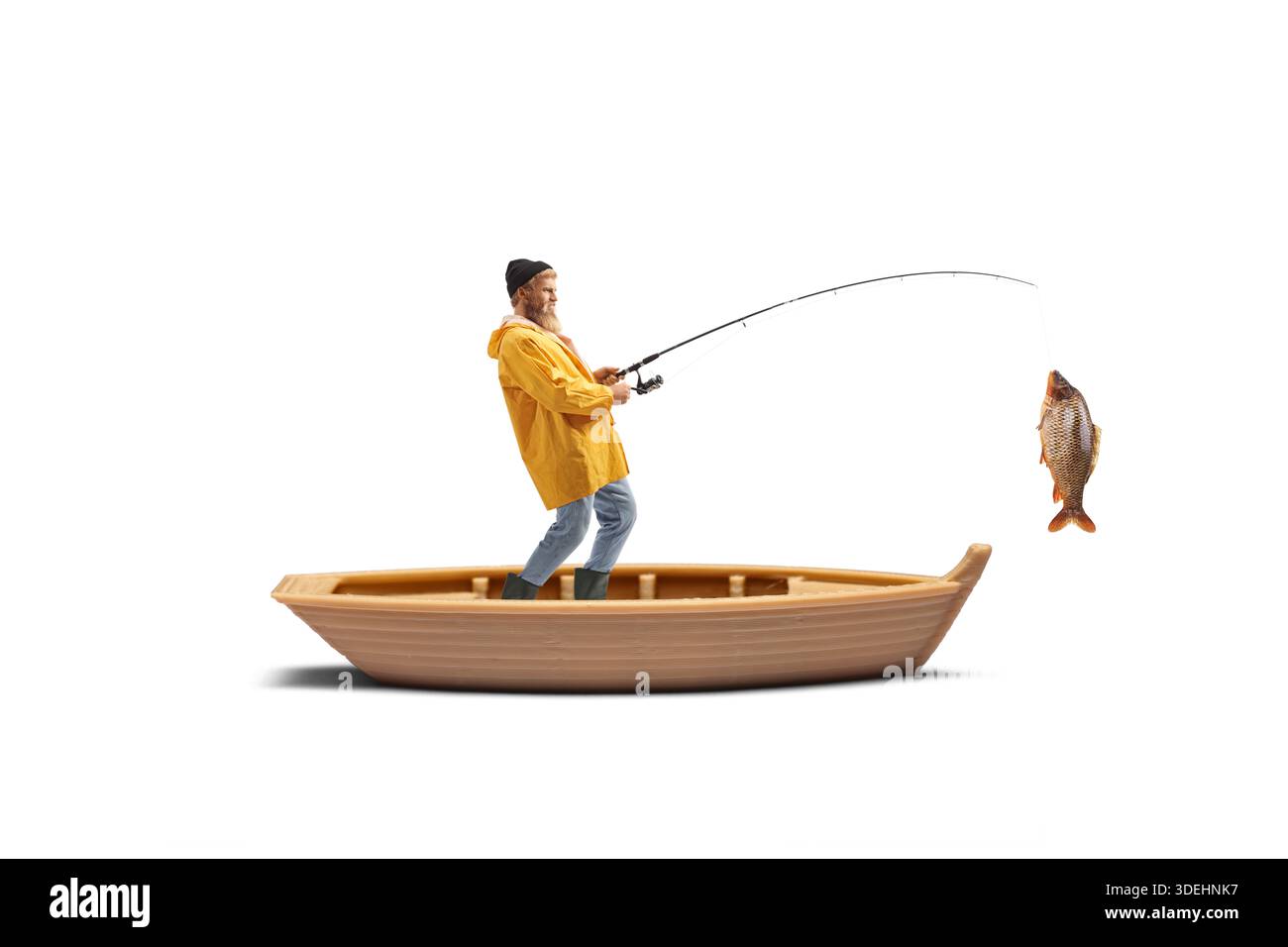 Fisherman in a small fishing boat Cut Out Stock Images & Pictures - Alamy