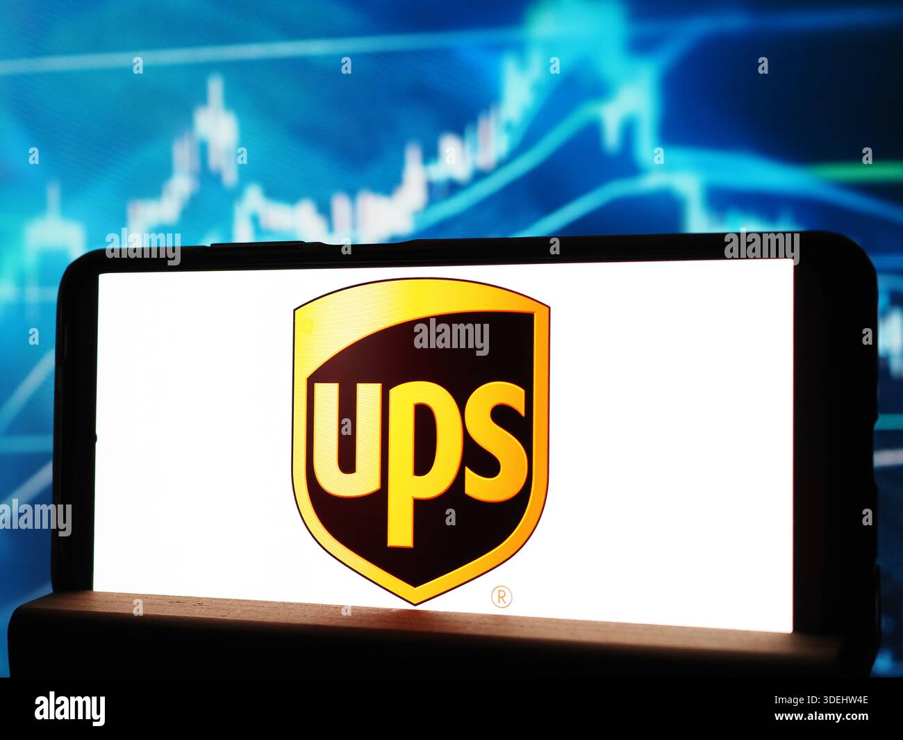In this photo illustration, the United Parcel Service, Inc. (UPS) logo ...