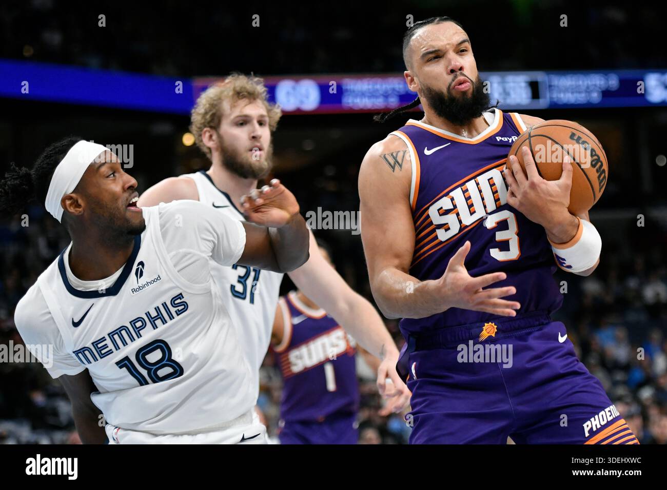 Phoenix Suns guard Dillon Brooks (3) handles the ball against Memphis ...