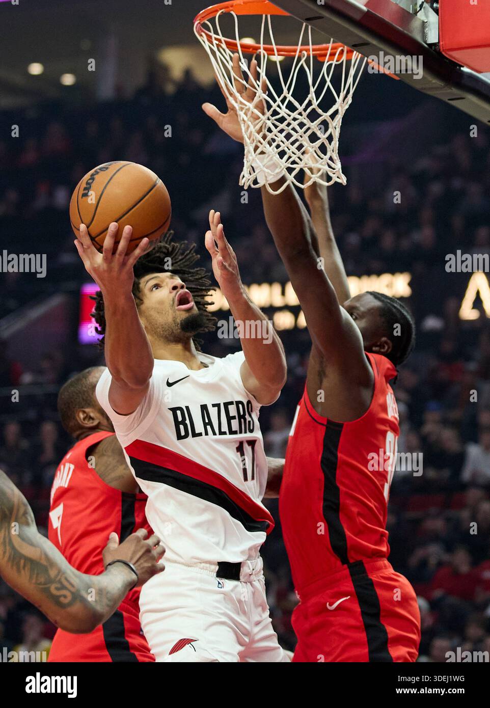Portland Trail Blazers guard Shaedon Sharpe, left, shoots over Houston ...