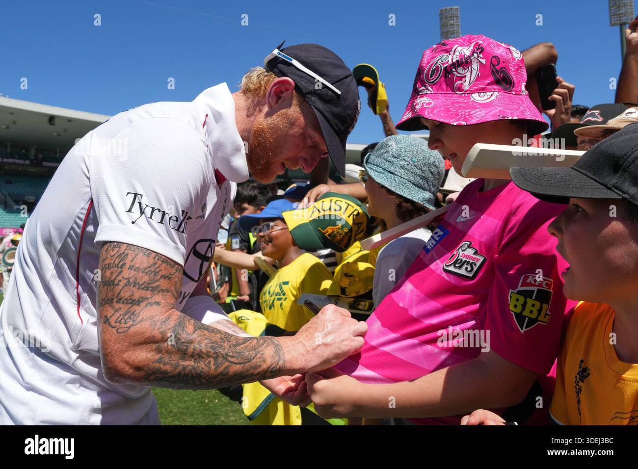 England's Ben Stokes signs his autograph for a fan following the fifth ...