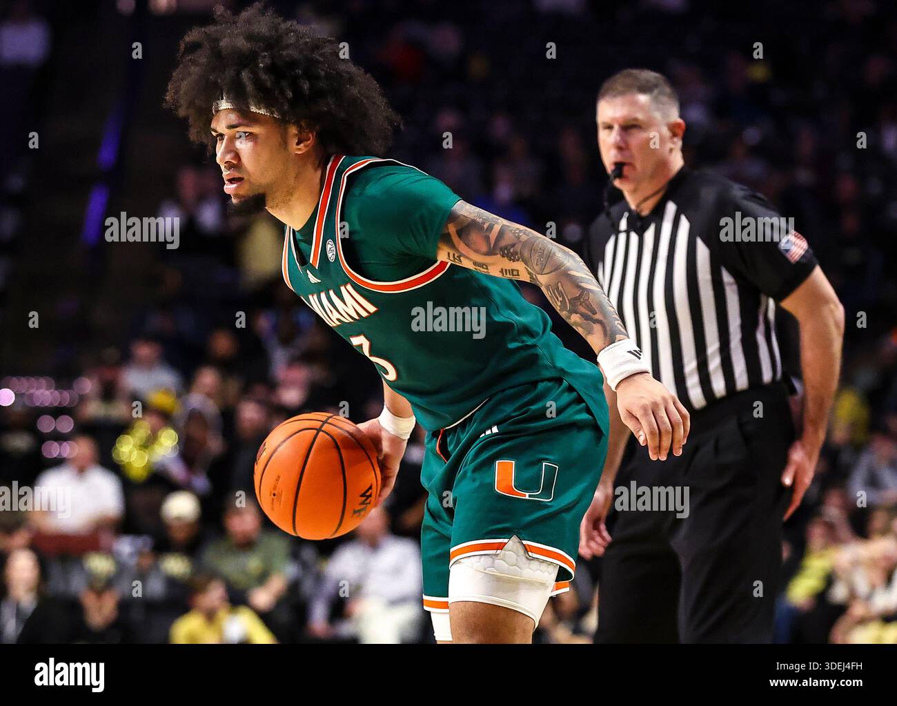 January 7, 2026: University of Miami guard Tre Donaldson (3) dribbles ...