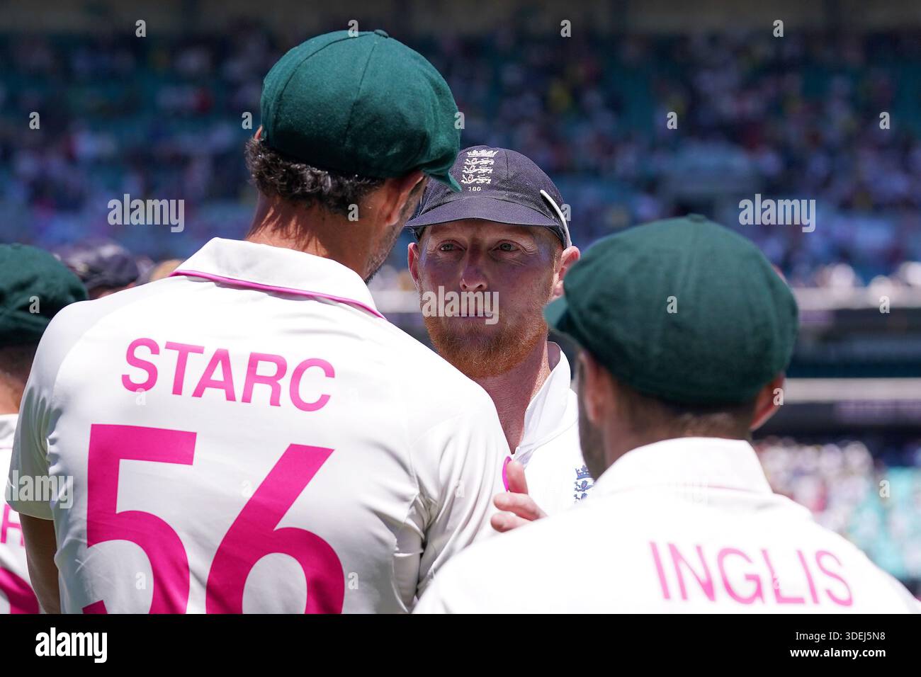 England’s Ben Stokes (centre) shakes hands with Australia's Mitchell ...