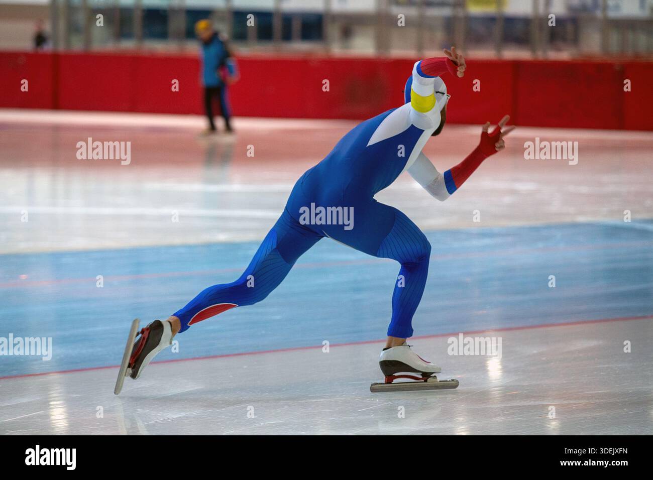 Starting acceleration of athlete in speed skating competition Stock ...