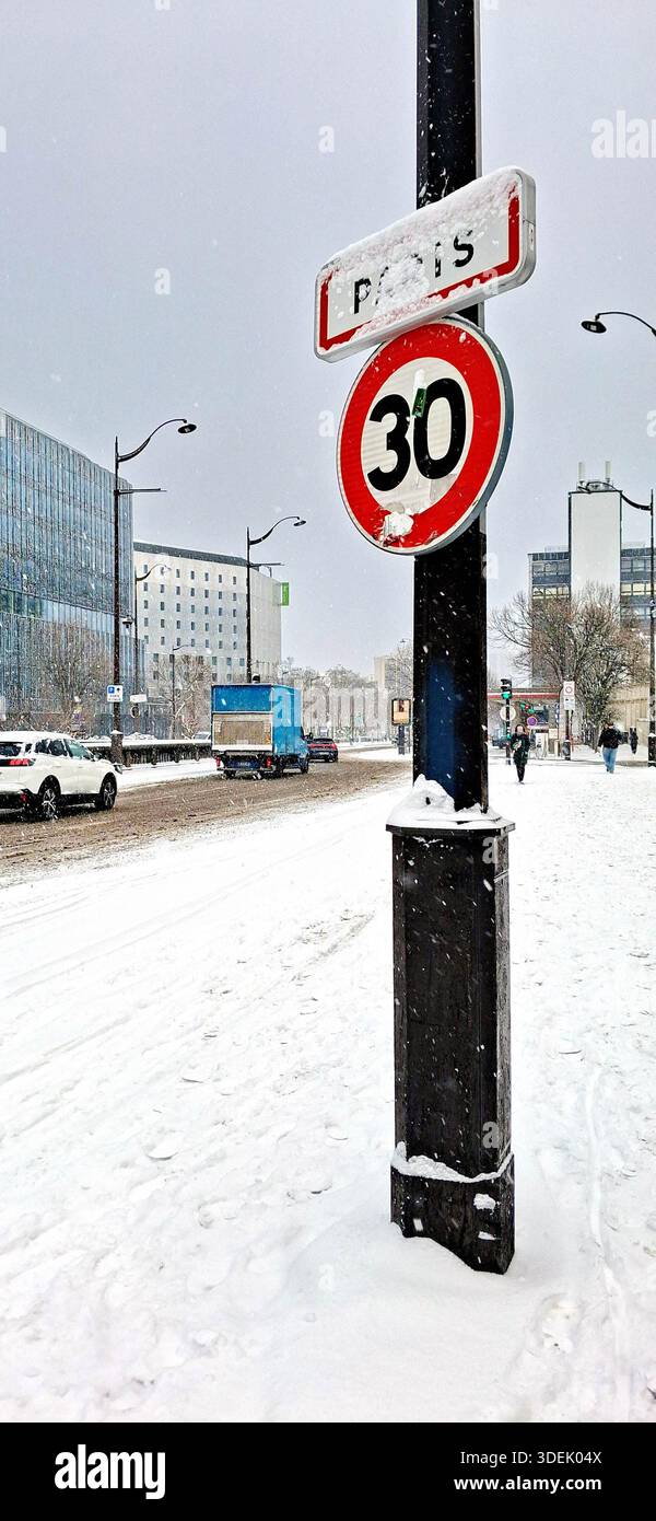 After a long snowfall at night, Paris, the 13th arrondissement district ...