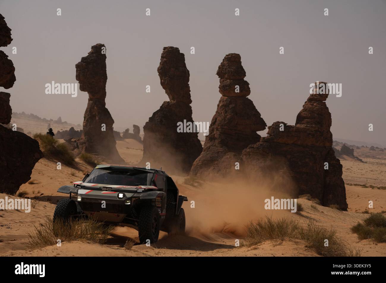 Driver Nasser Al-Attiyah and co-driver Fabian Lurquin compete during ...