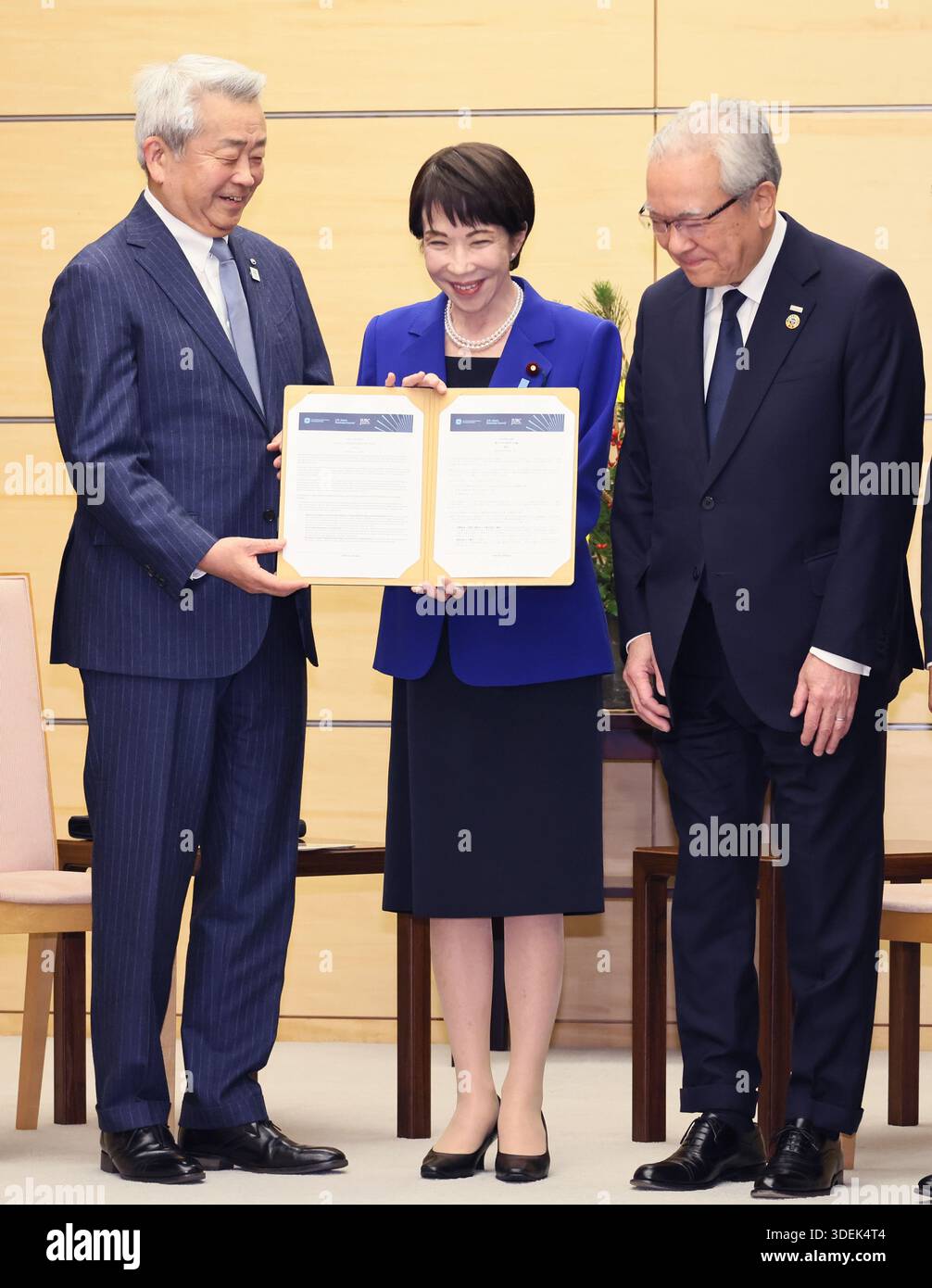 Japanese Prime Minister Sanae Takaichi (C) receives a courtesy call ...