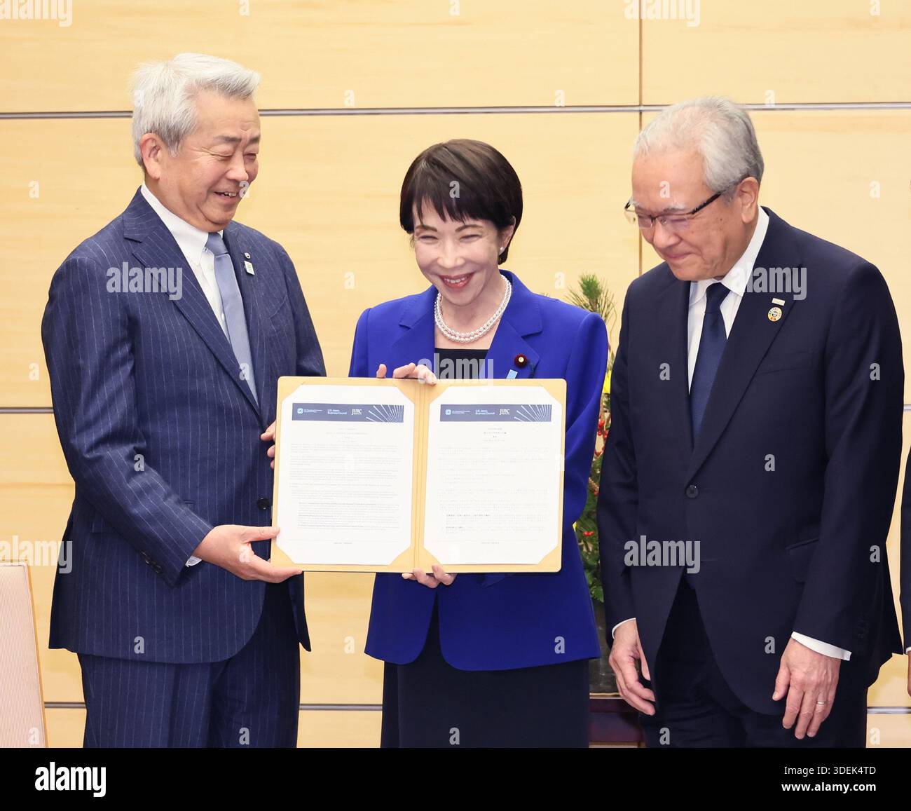 Japanese Prime Minister Sanae Takaichi (C) receives a courtesy call ...