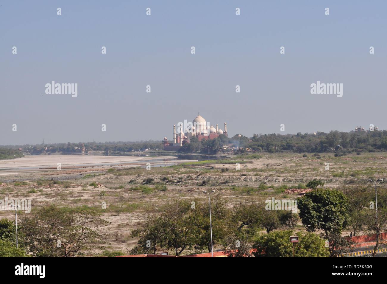 Distant View of the Taj Mahal Across the Yamuna River Landscape in Agra ...