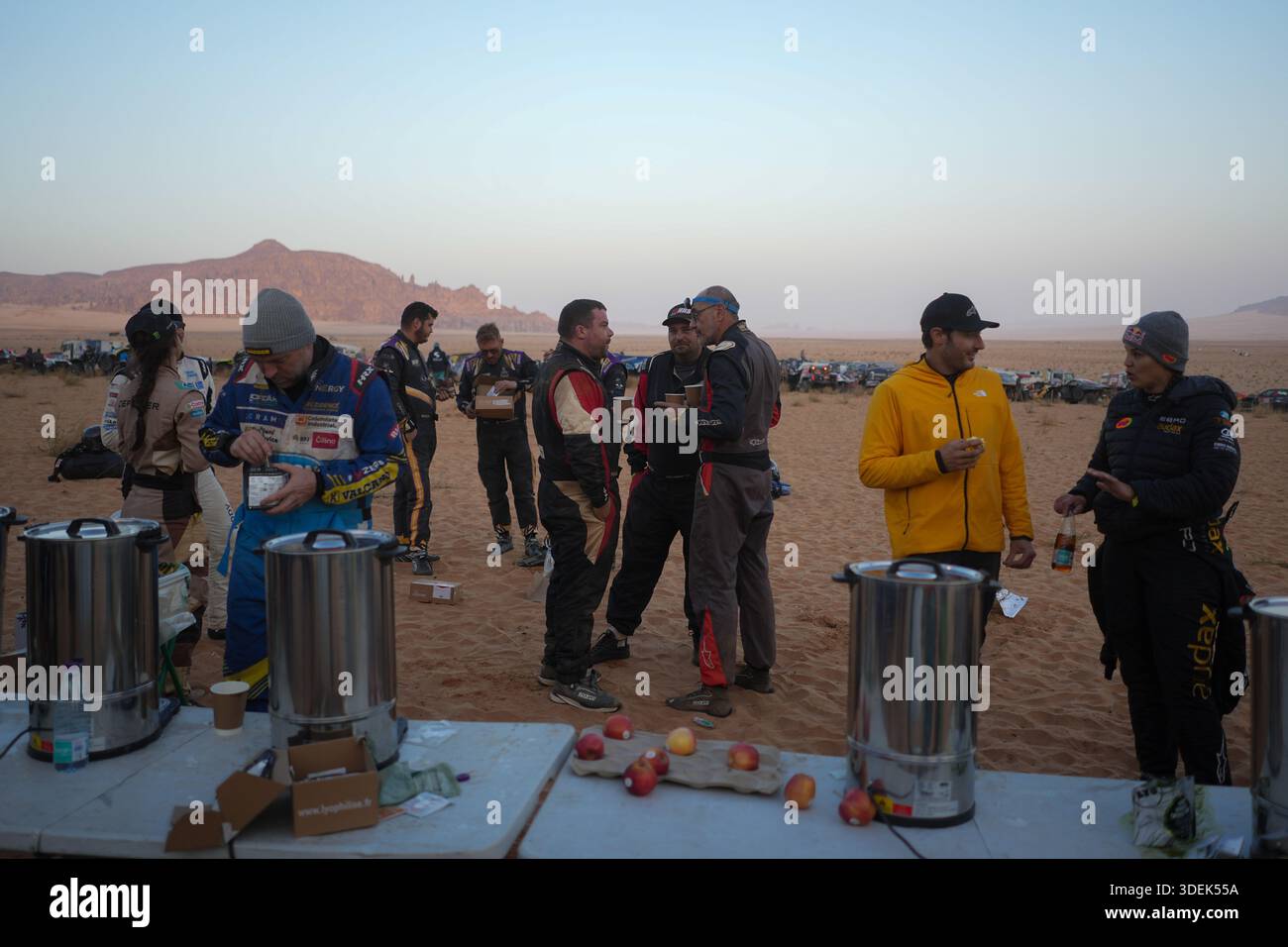 Drivers and co-drivers gather for a breakfast at the bivouac before the ...