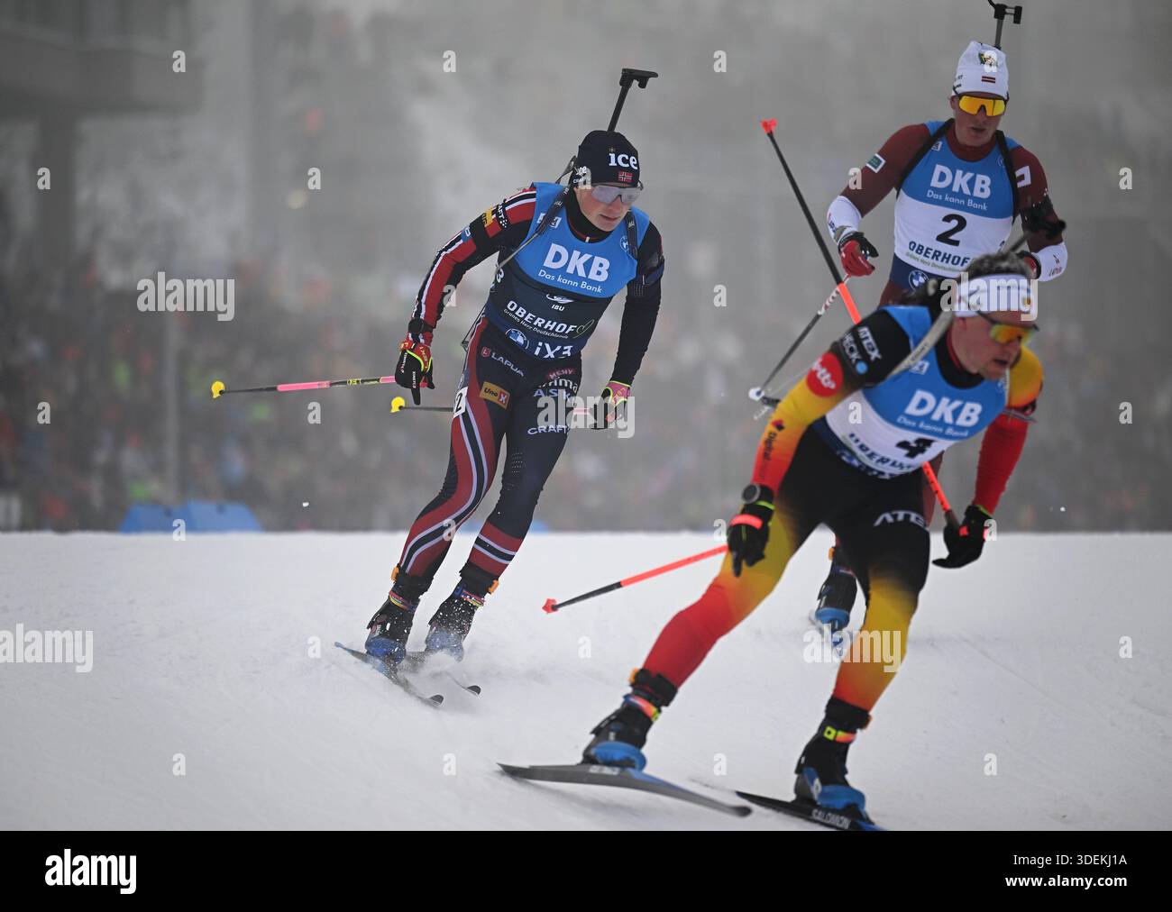 Isak Leknes Frey of Norway, left, competes in the men spring 10 km ...