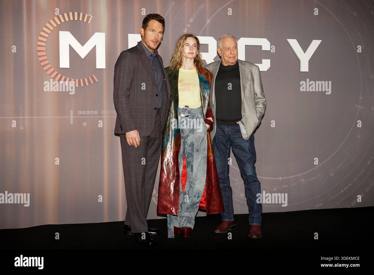 Chris Pratt, left, Rebecca Ferguson, center, and Chuck Roven pose for ...