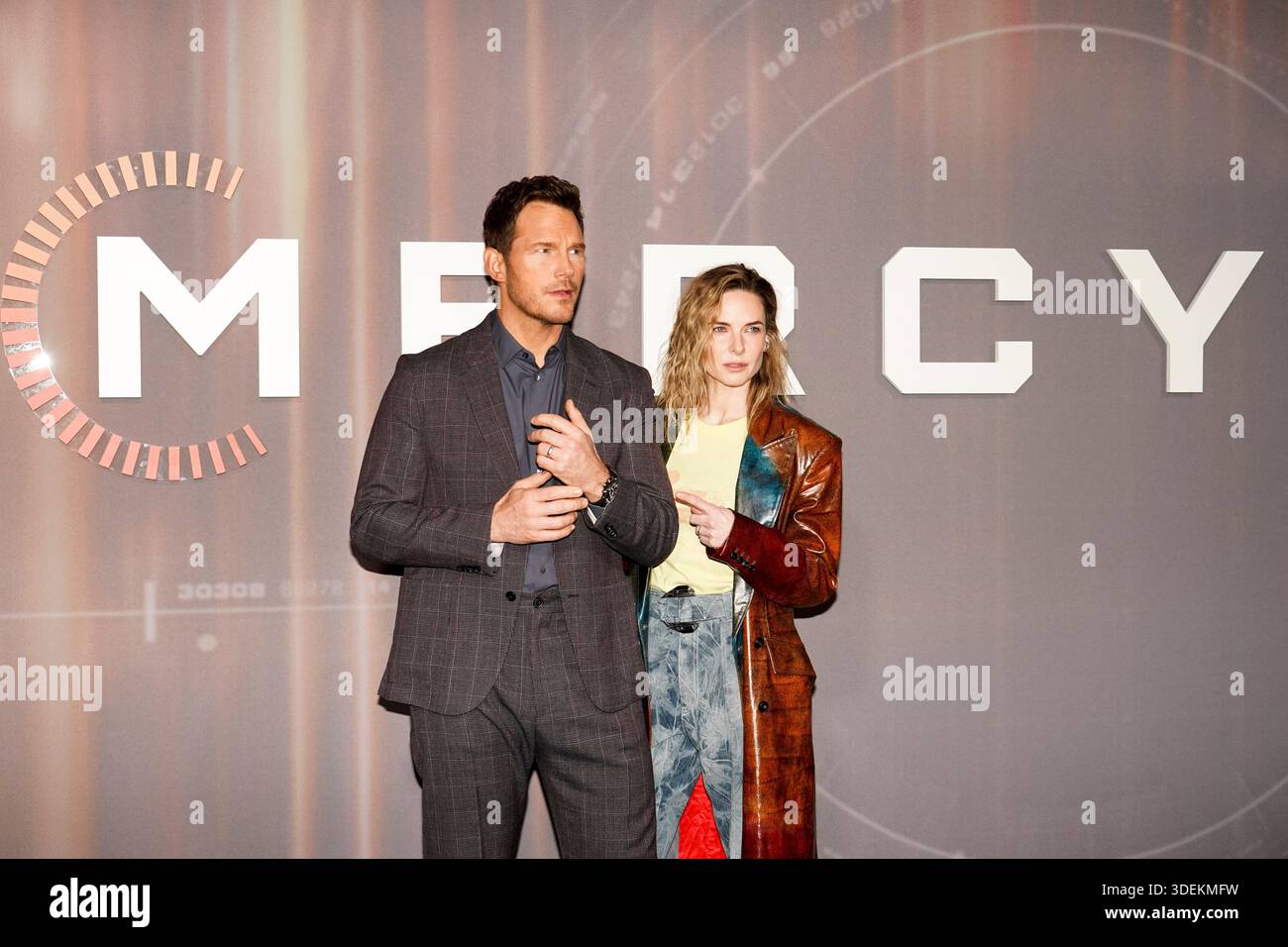 Chris Pratt, left, and Rebecca Ferguson pose for photographers upon ...