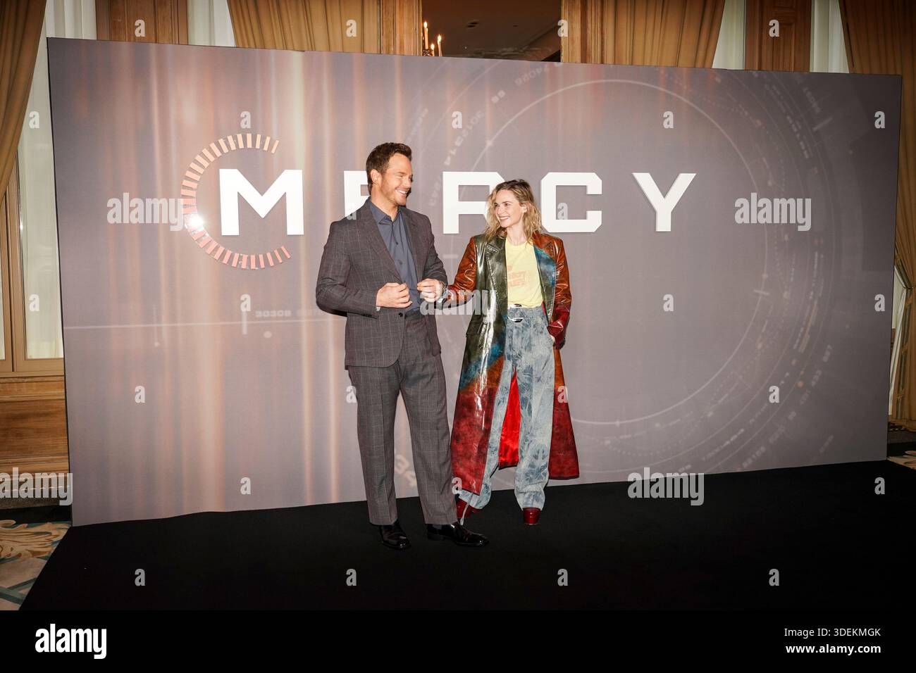 Chris Pratt, left, and Rebecca Ferguson pose for photographers upon ...