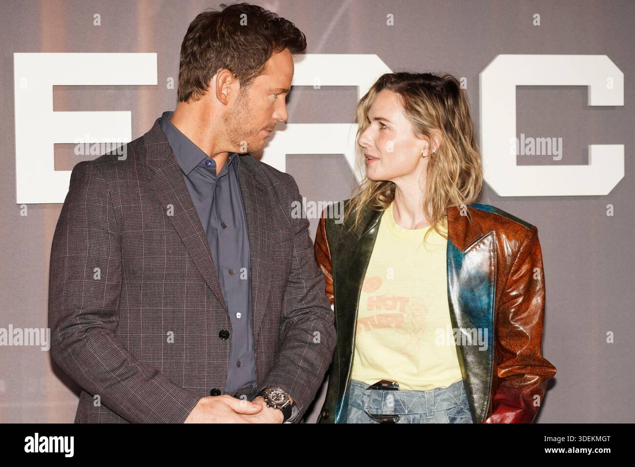Chris Pratt, left, and Rebecca Ferguson pose for photographers upon ...