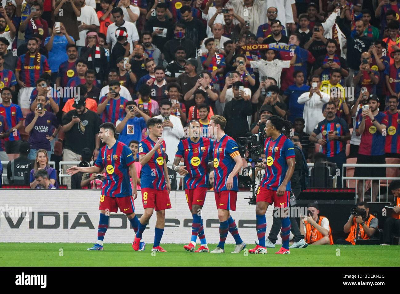 FC Barcelona players celebrate scoring their team's first goal during ...