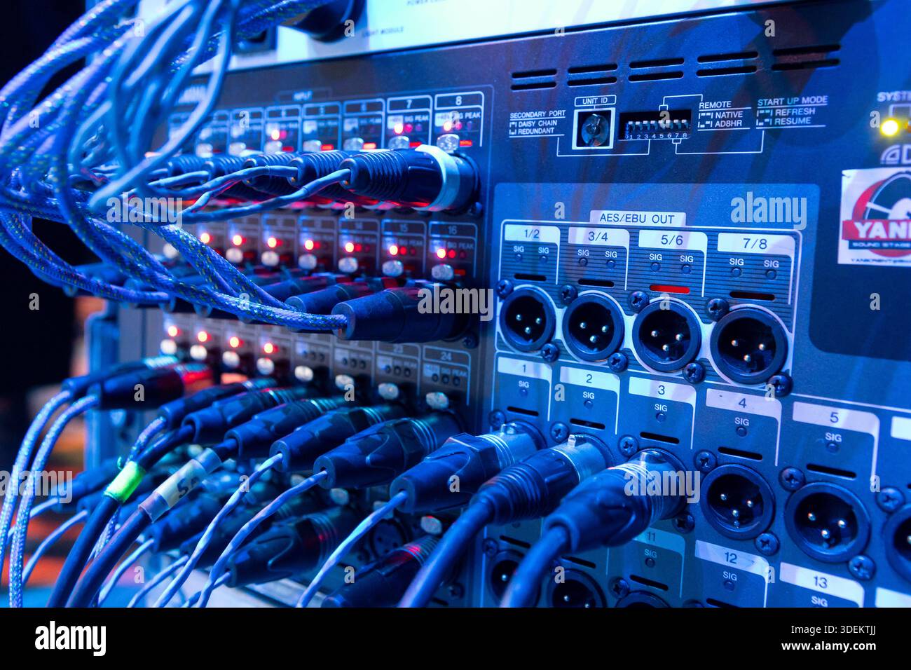 Switching stage equipment on a concert hall stage. Technicians prepare ...