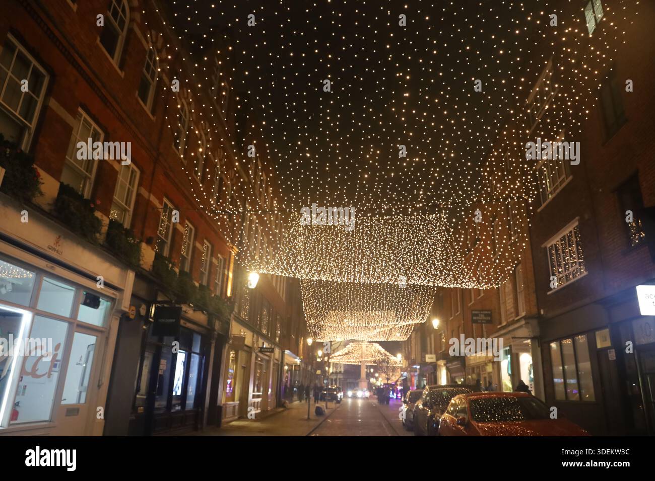 The Seven Dials Monument illuminated with festive canopy lights during ...
