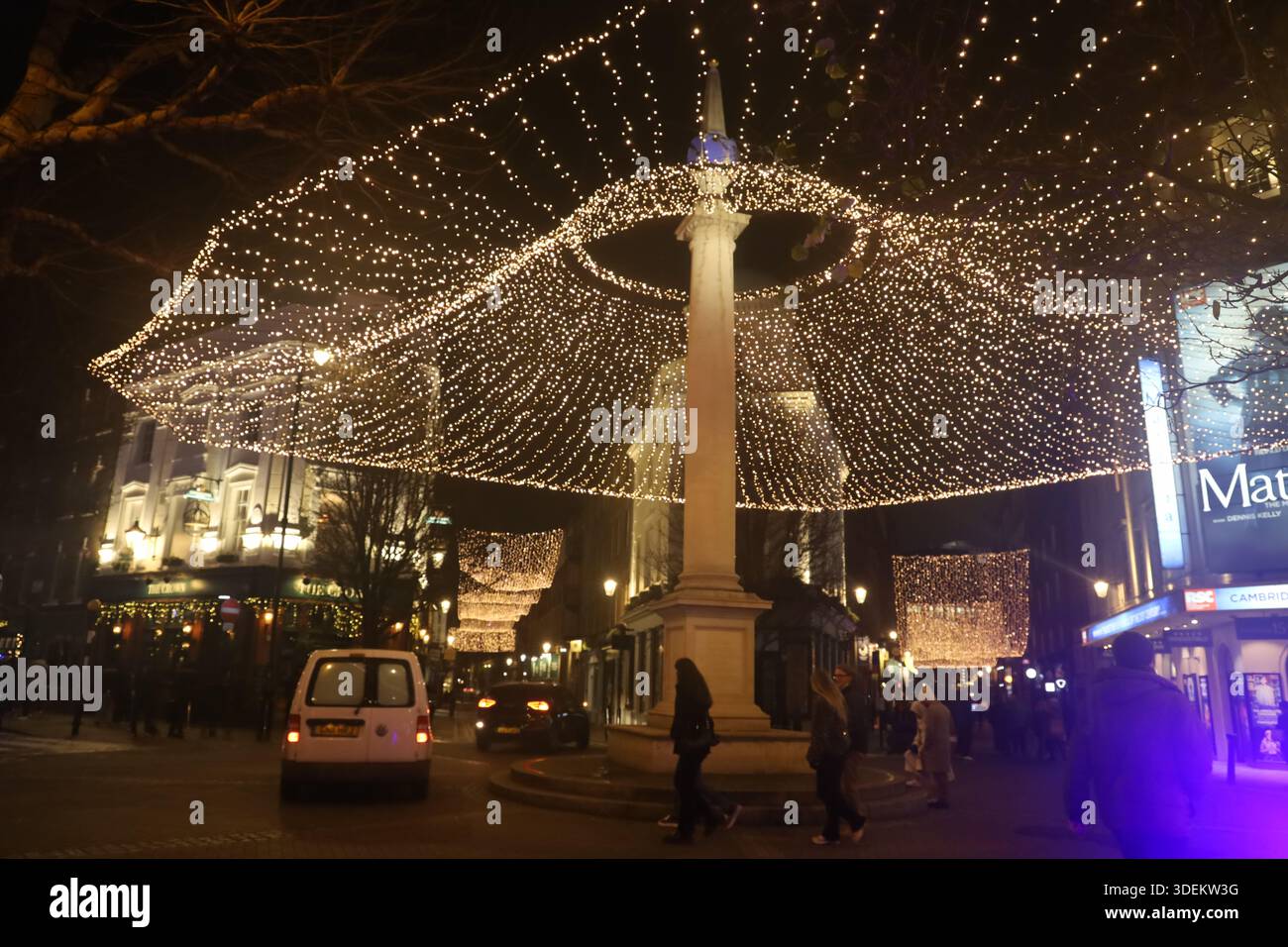 The Seven Dials Monument illuminated with festive canopy lights during ...