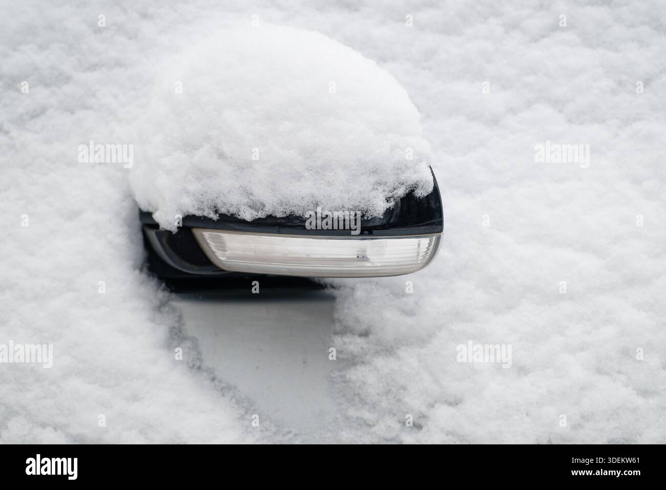 08 January 2026, Baden-Württemberg, Heidelberg: A rear-view mirror ...
