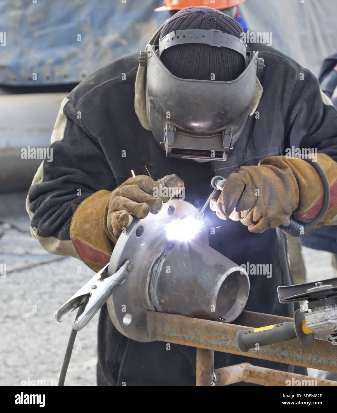 Manual arc welding conical transition with a skirted flange on mobile ...