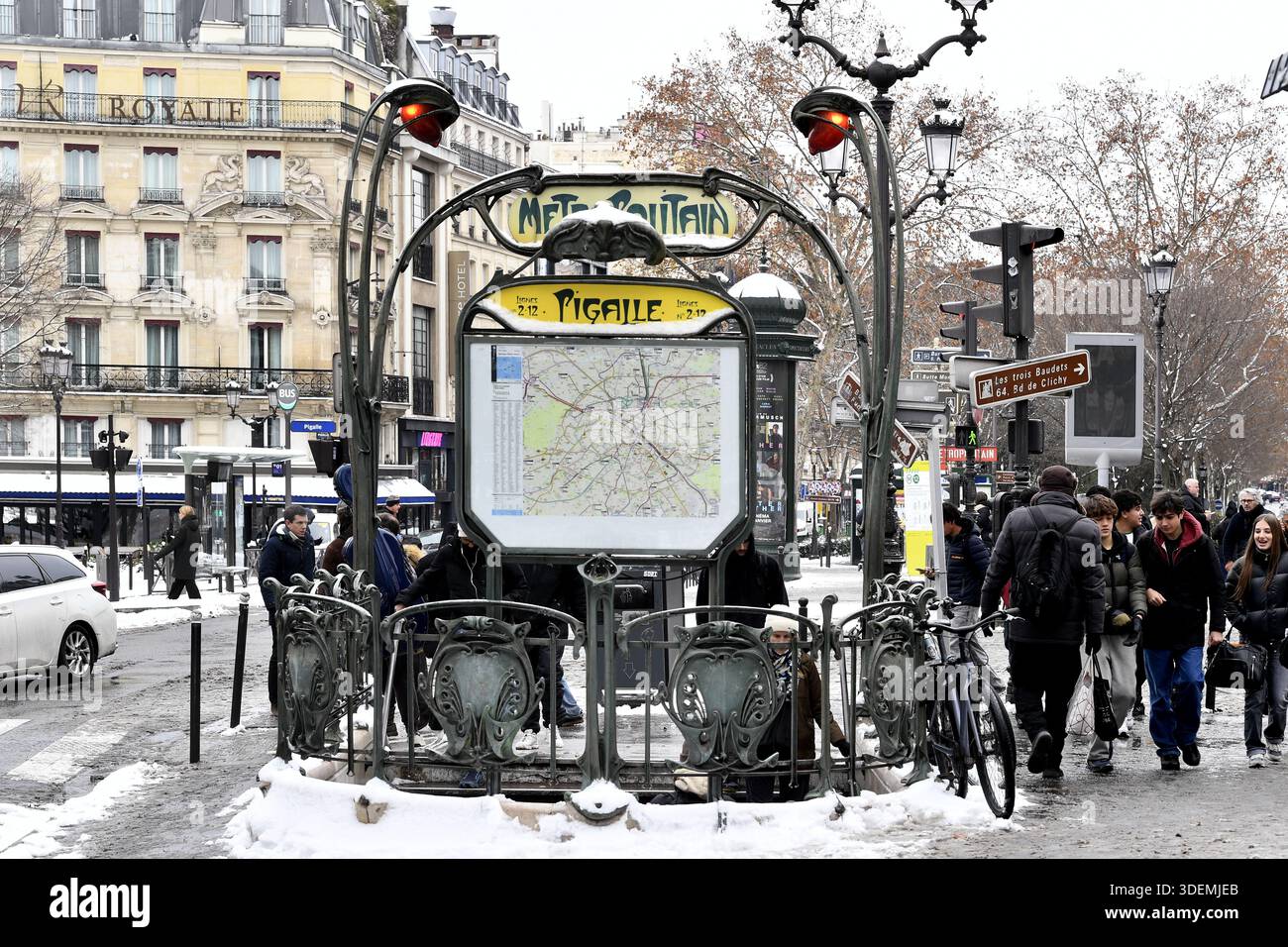 Pigalle Metro station after a heavy fall of snow in winter in Paris ...
