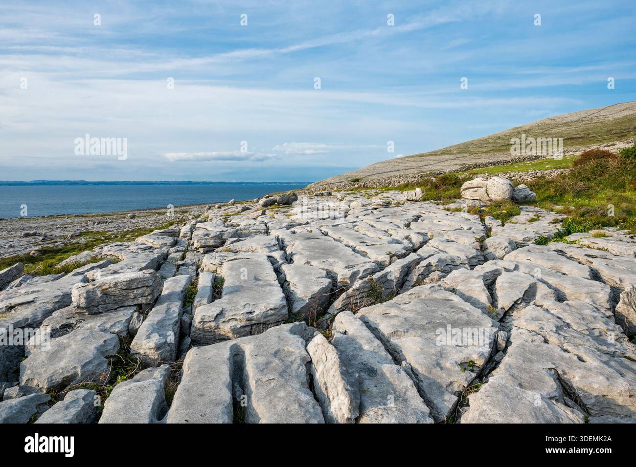Limestone pavement with erratic boulders deposited by a glacier during ...