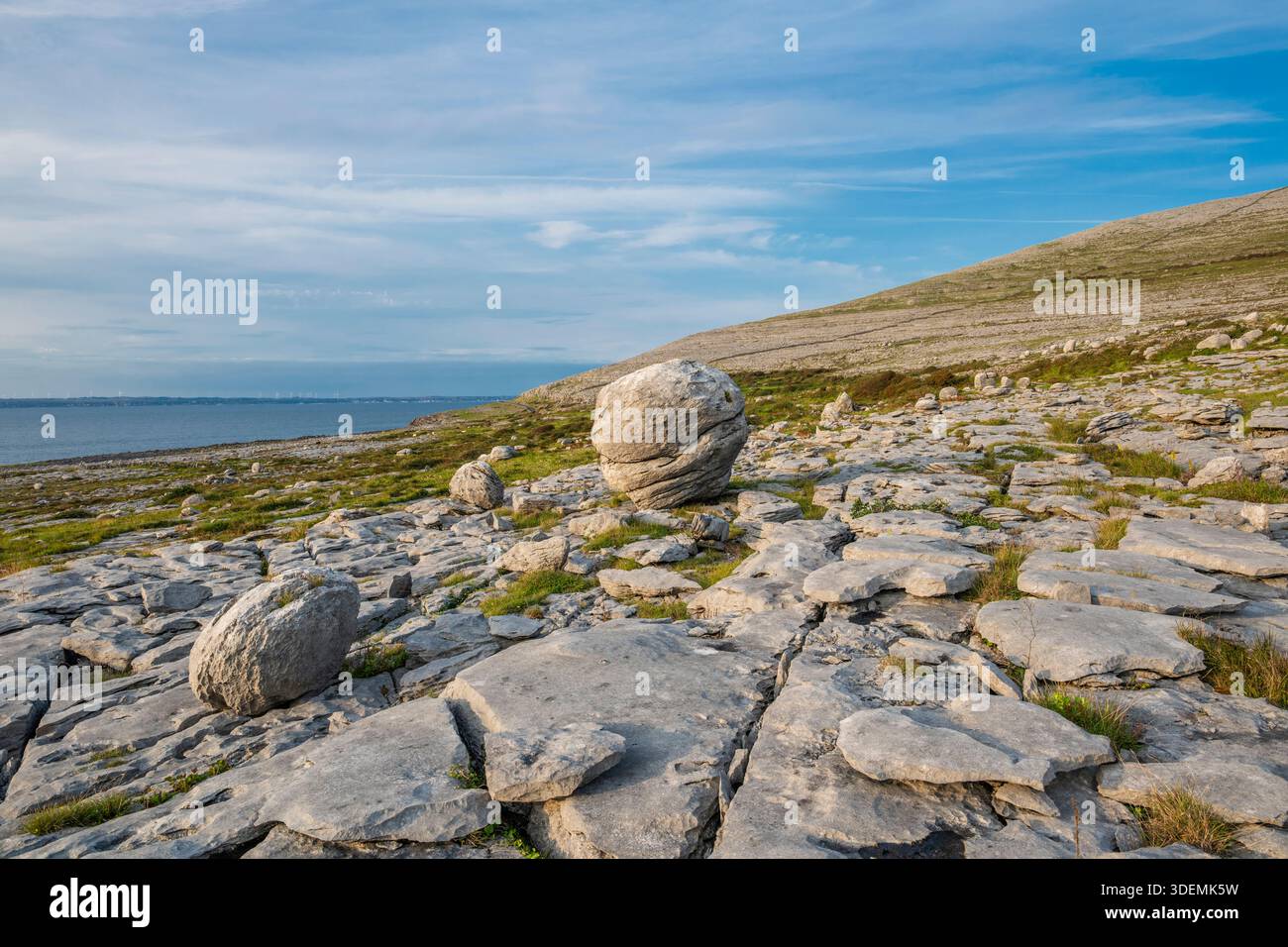Limestone pavement with erratic boulders deposited by a glacier during ...