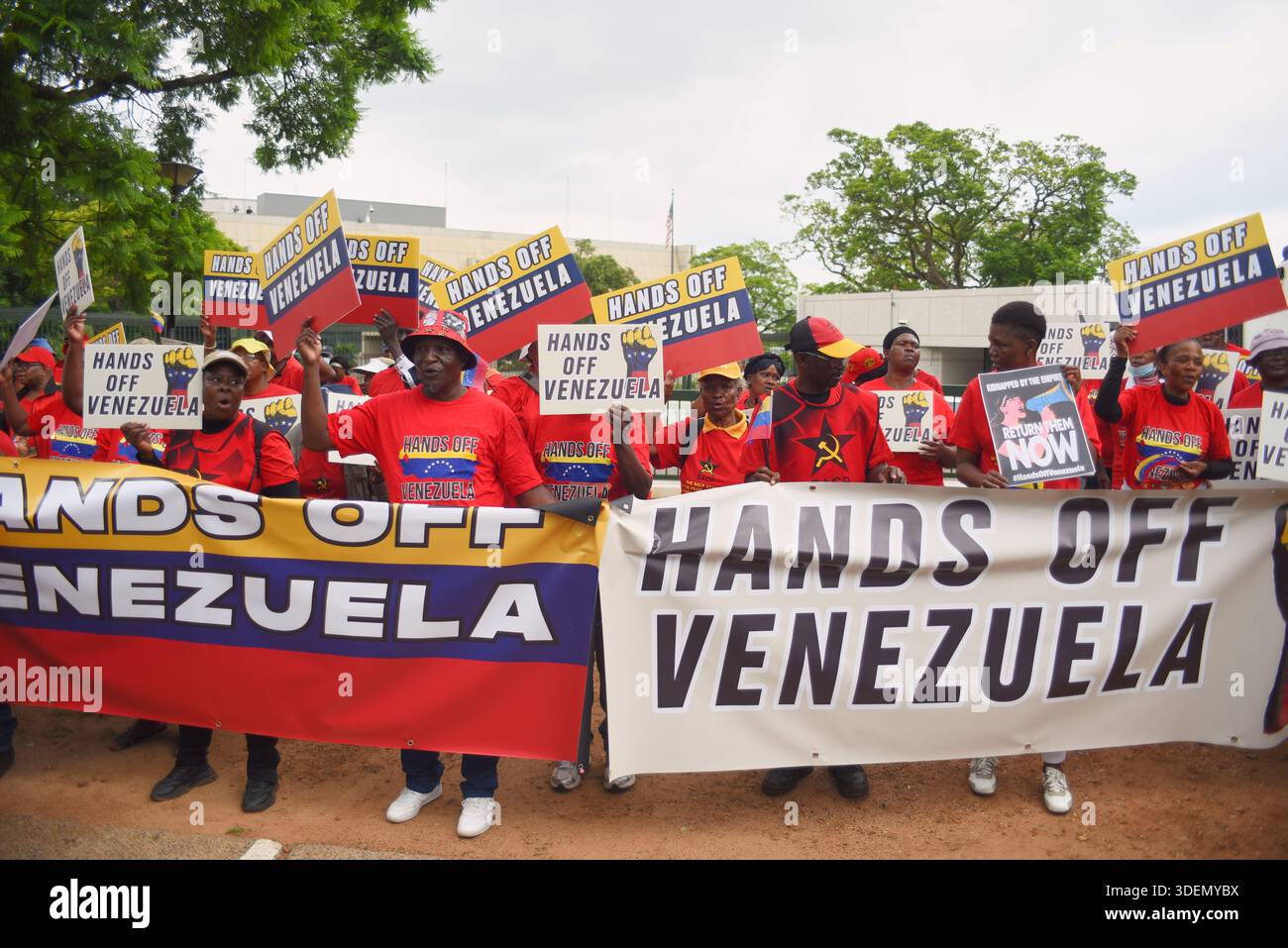 People hold placards and banners as they demonstrate outside the U.S ...