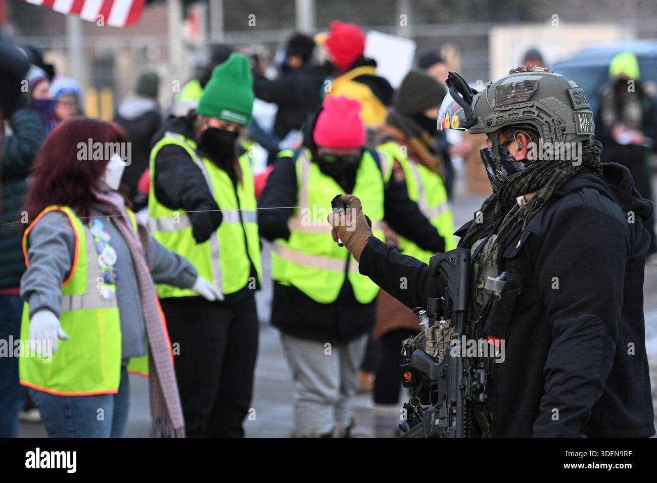 Law enforcement uses a chemical agent on protesters outside the Bishop ...