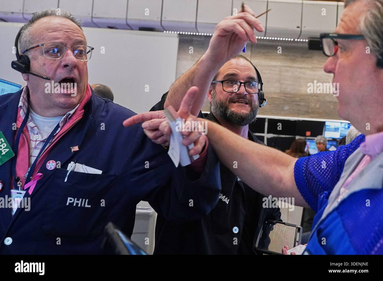 Options traders Phil Fracassini, Chris Dattolo, and Ed Nagle, left to ...