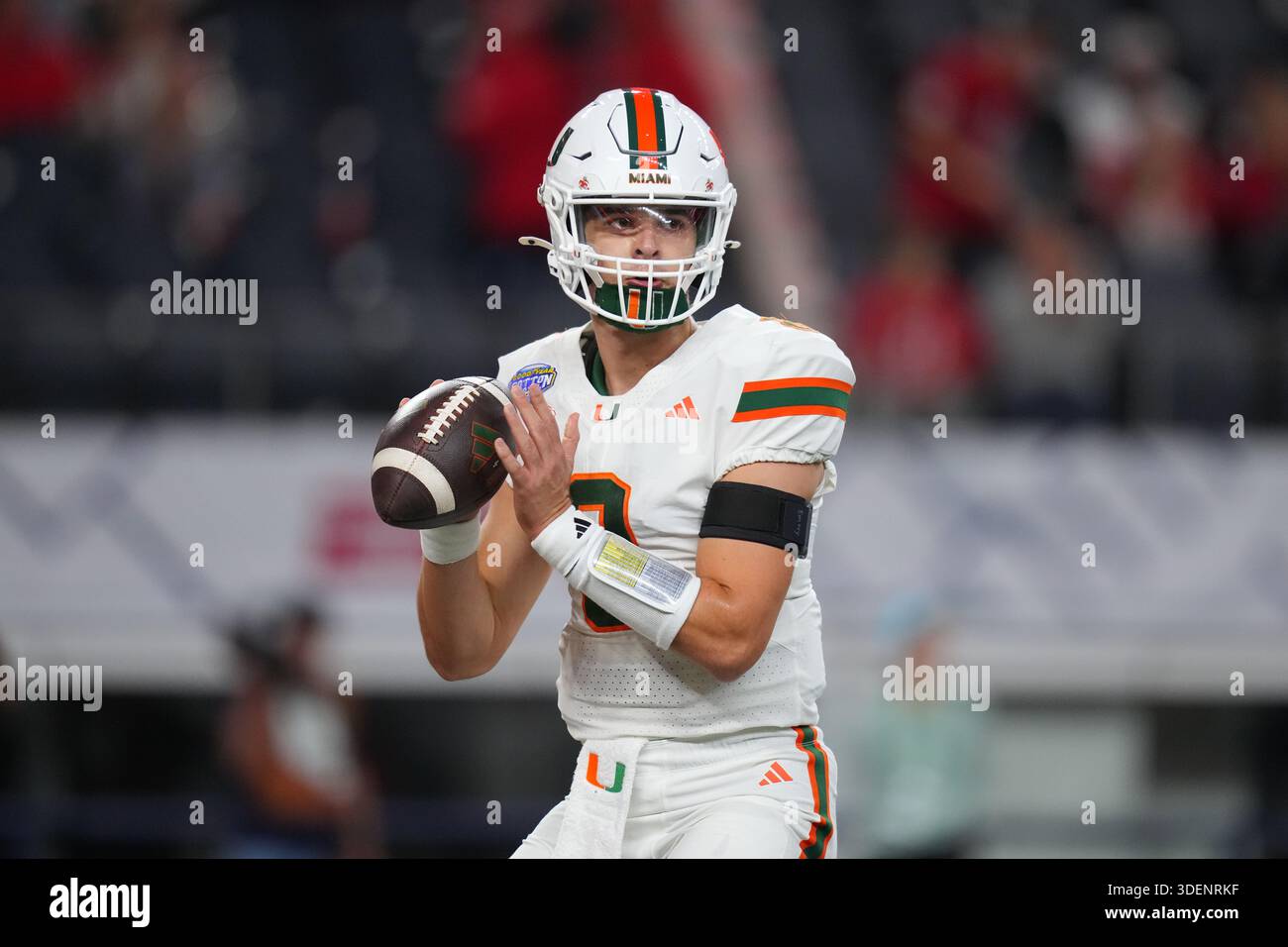 Miami quarterback Emory Williams works out prior to the Cotton Bowl ...