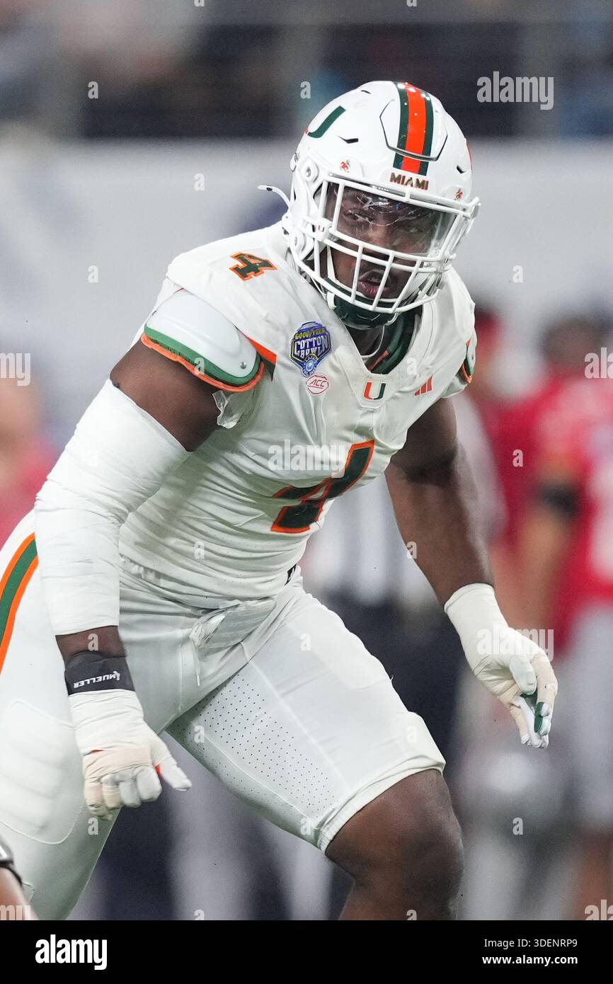 Miami defensive lineman Rueben Bain Jr. rushes in during the Cotton ...