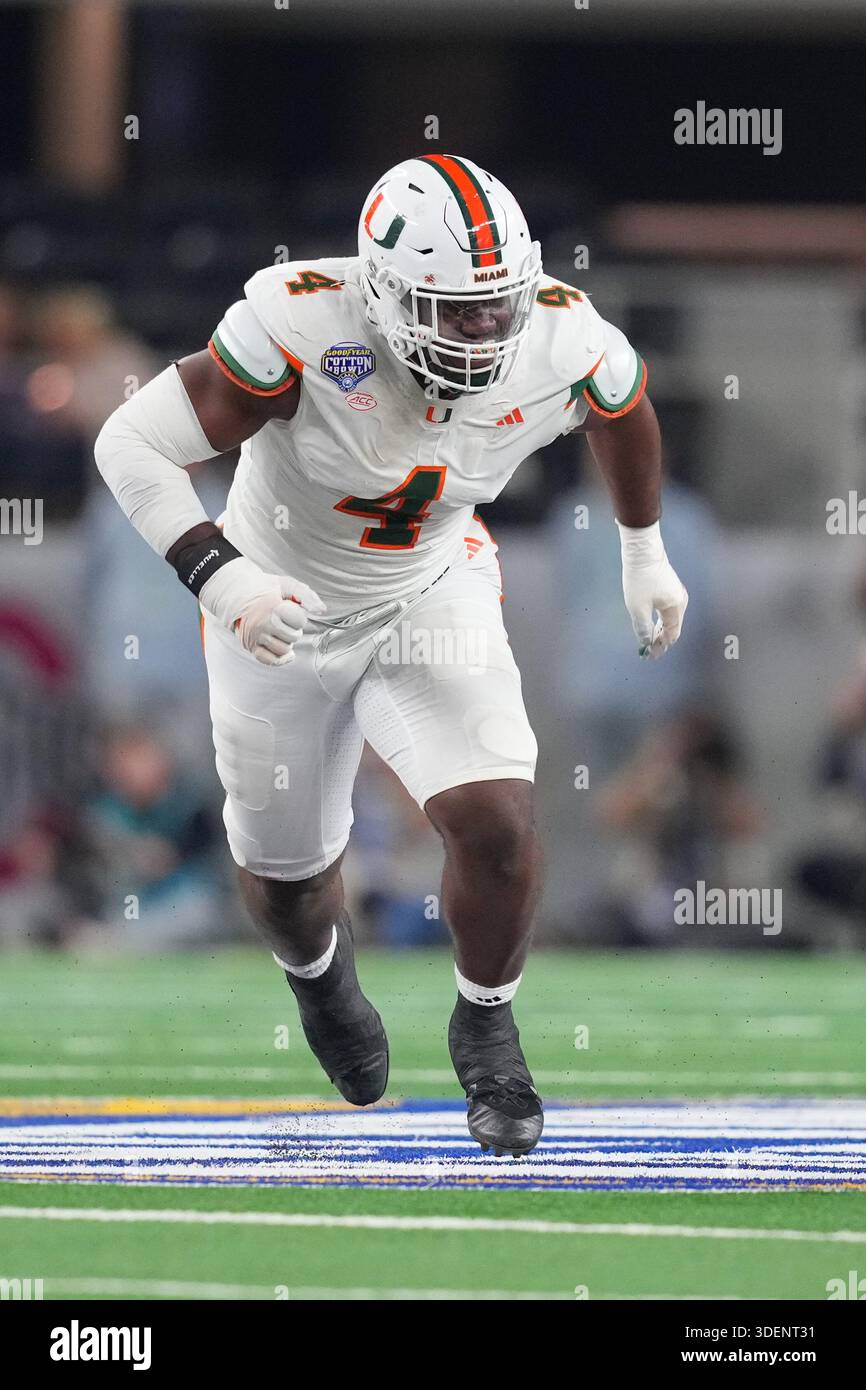 Miami defensive lineman Rueben Bain Jr. rushes in during the Cotton ...