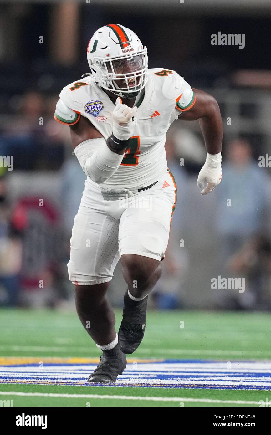 Miami defensive lineman Rueben Bain Jr. rushes in during the Cotton ...