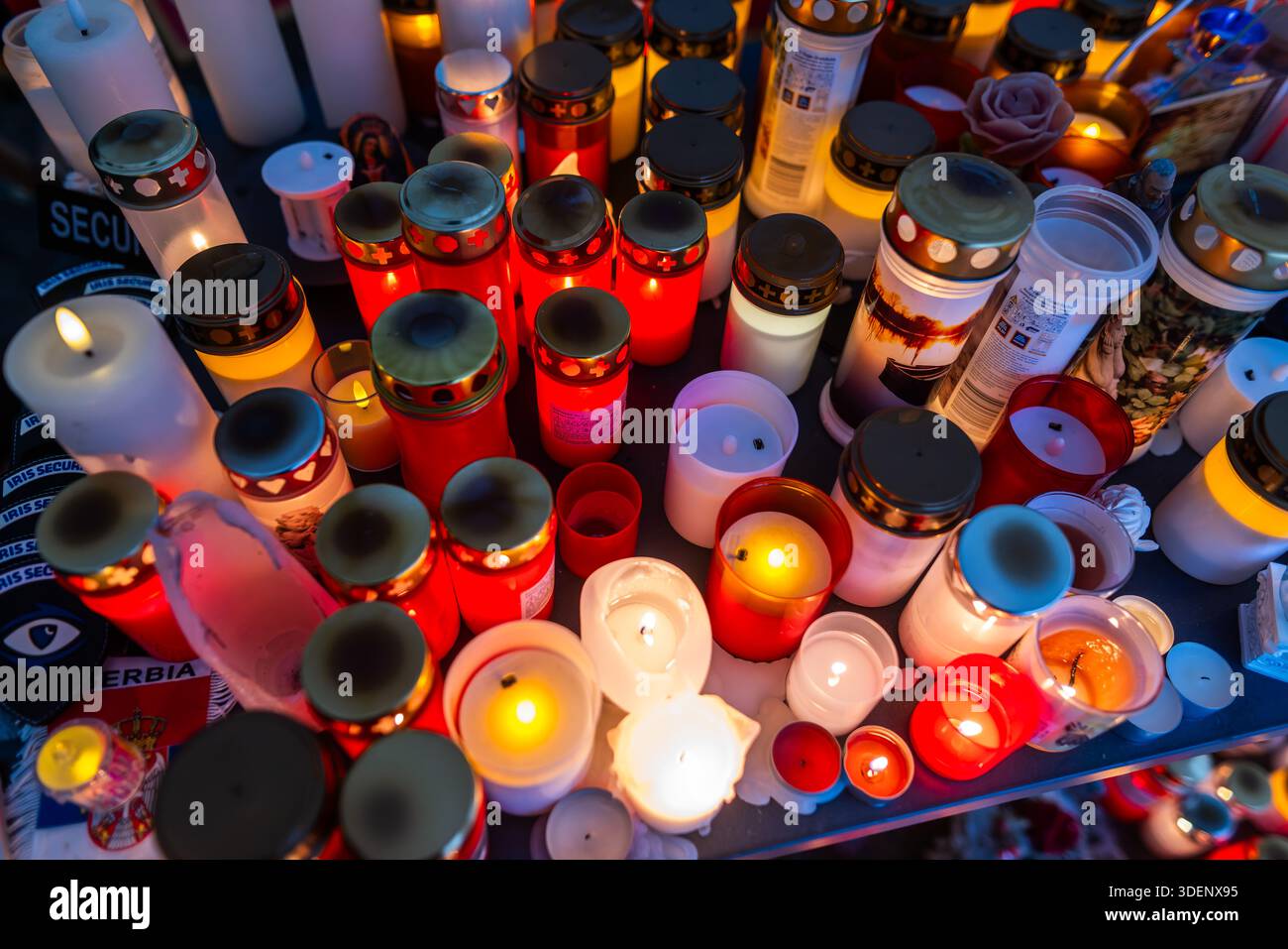 08 January 2026, Switzerland, Crans Montana: Candles burn near the ...