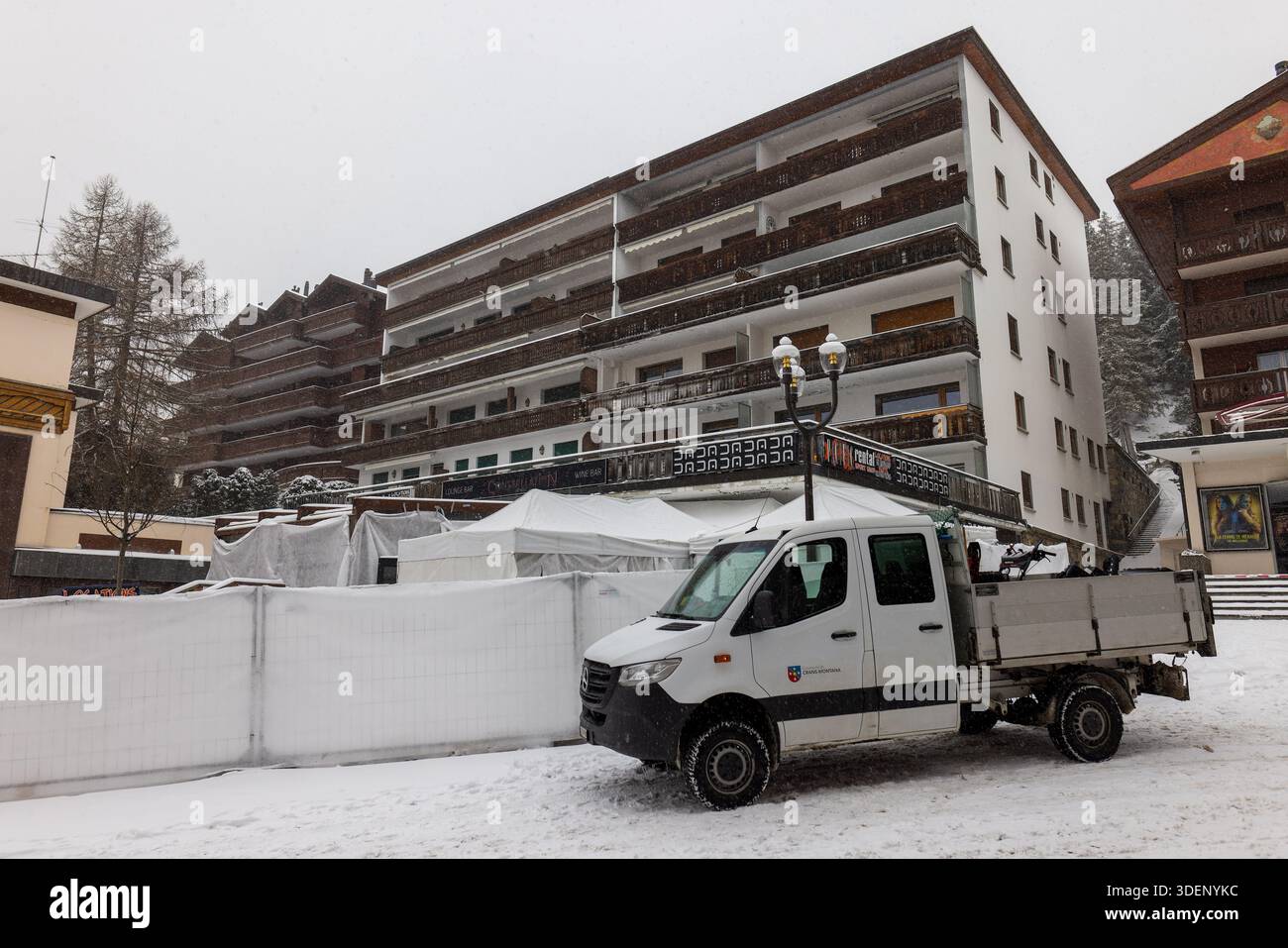 08 January 2026, Switzerland, Crans Montana: A municipal vehicle stands ...