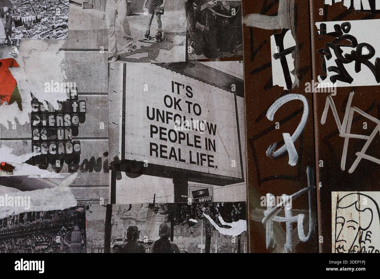 Poster on wall reads "It's OK to unfollow people in real life Stock ...