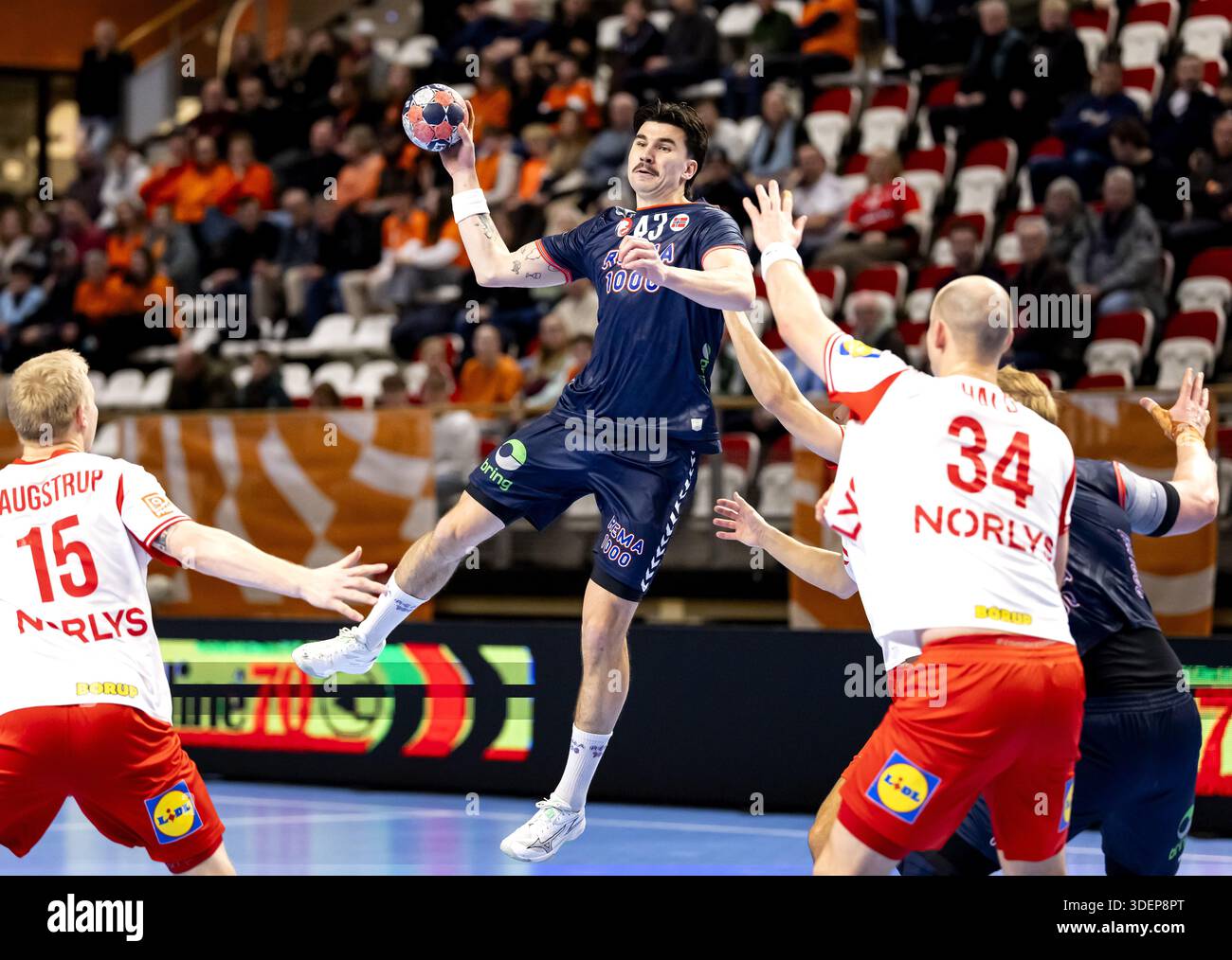 ALMERE - Norway's Simen Ulstad Lyse in action against Denmark's Magnus ...
