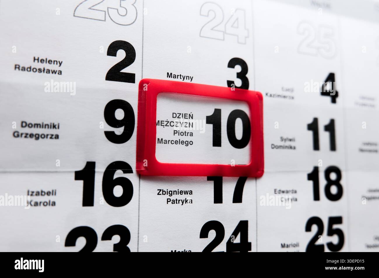 Wall calendar close-up with red frame marking International Men’s Day ...