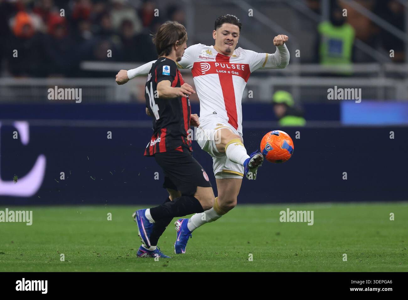 Milan, Italy, 8th January 2026. Vitinha of Genoa CFC anticipates Luka ...
