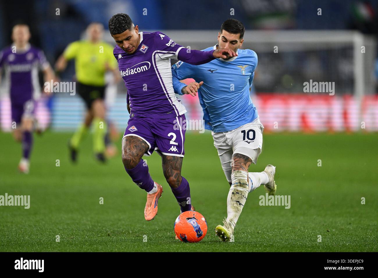 Dodo of A.C.F. Fiorentina and Mattia Zaccagni of S.S. Lazio are in ...