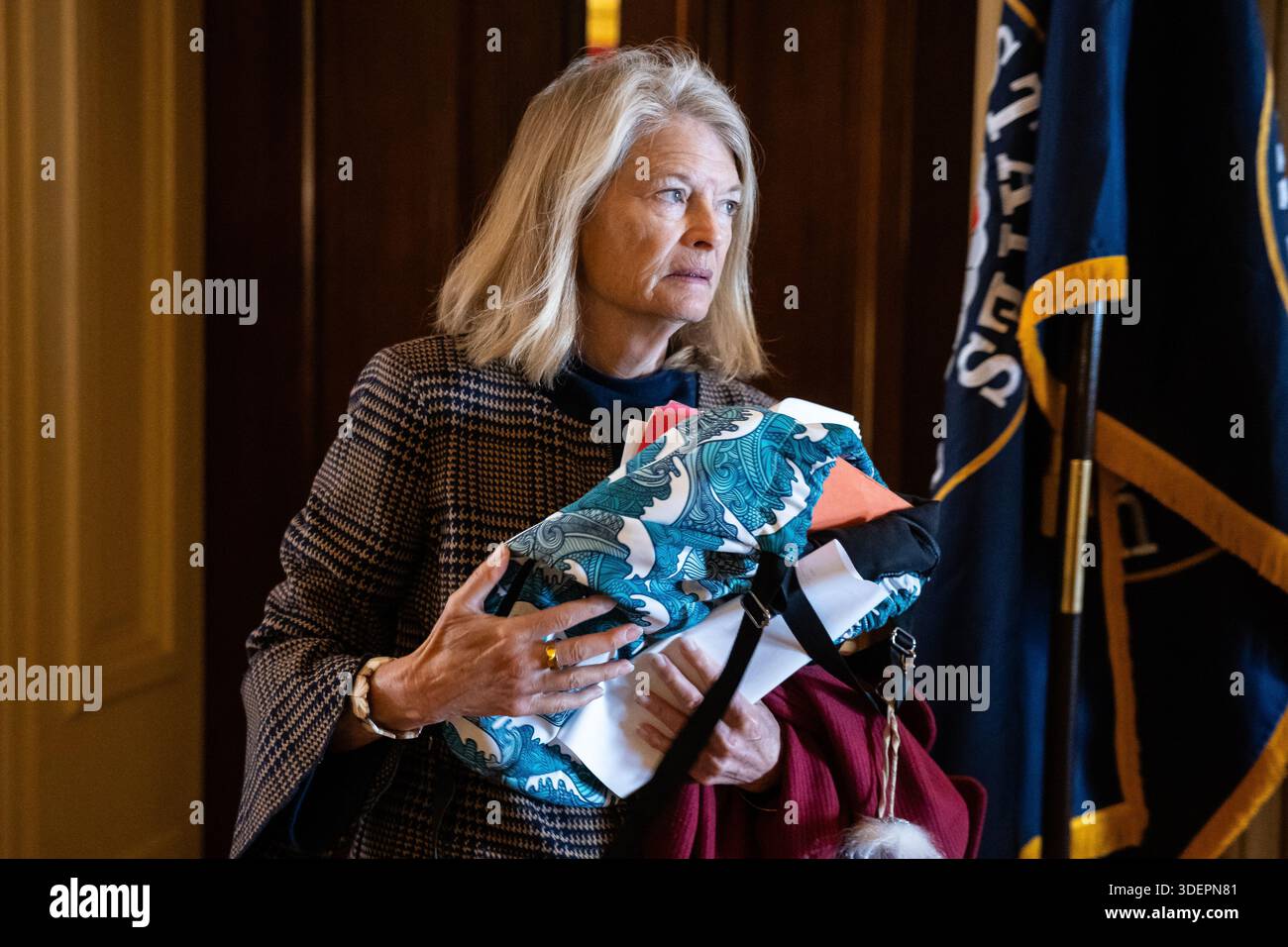 Sen. Lisa Murkowski (R-Alaska) emerges from a meeting about health care ...