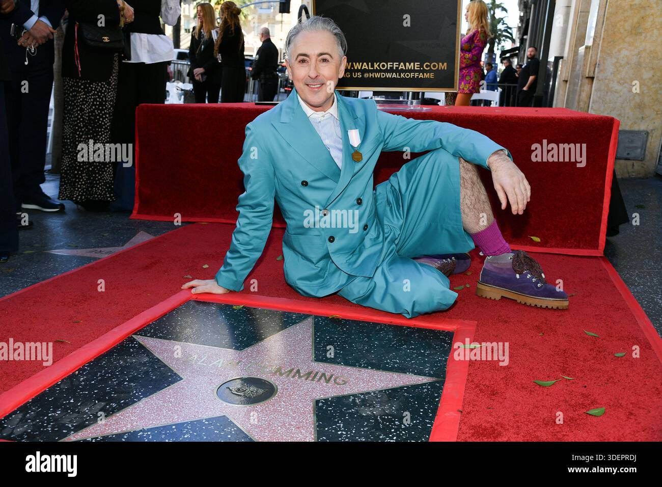 Alan Cumming poses during a ceremony honoring Cumming with a star on ...