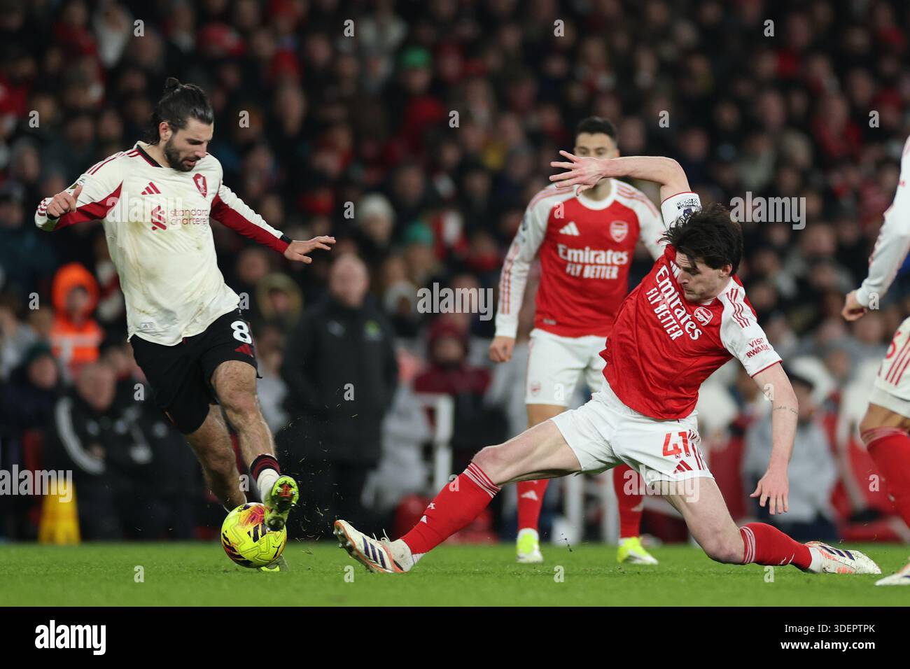 Liverpool's Dominik Szoboszlai, left, and Arsenal's Declan Rice fight ...