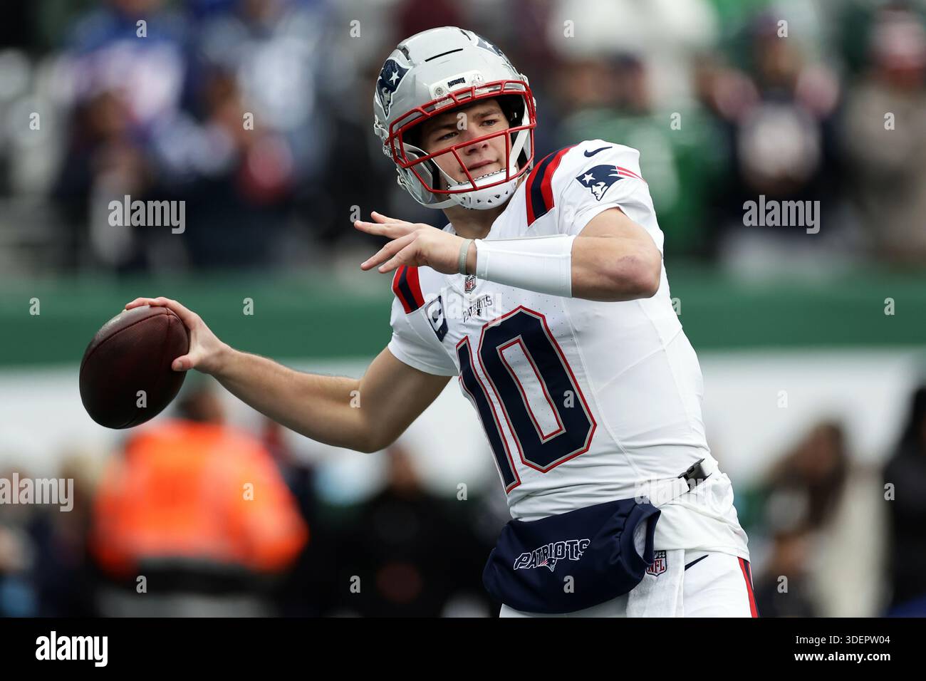 New England Patriots quarterback Drake Maye (10) warms up before an NFL ...